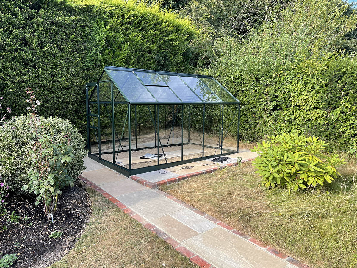 Greenhouse, path and paving - South Coast Handyman